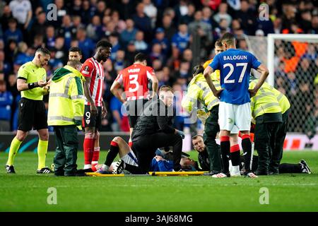 Rangers' Bailey Rice receives treatment following an injury during the ...