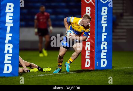Leeds Rhinos Lachie Miller scores a try and celebrates during the ...