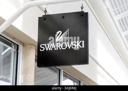 Swarovski store hanging sign in Orlando, Florida, USA Stock Photo - Alamy