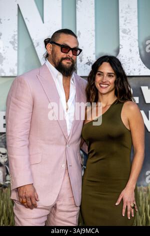 Adria Arjona and Jason Momoa attend the premiere of Highest 2 Lowest at ...