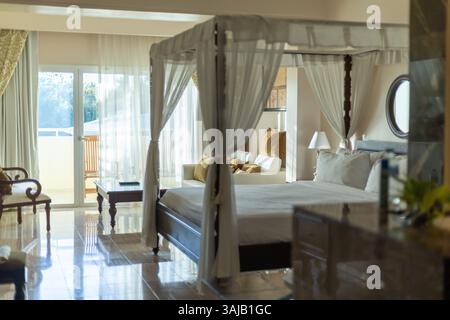 Chic hotel environment with natural light and professional traveler ...