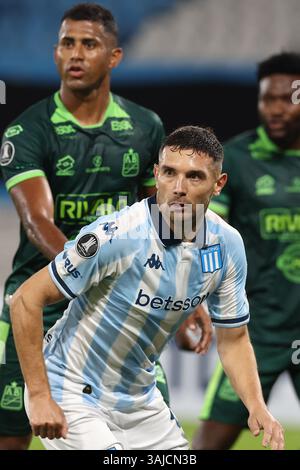 Adrian Martinez of Argentina's Racing Club, left, and Jesus Trindade of ...