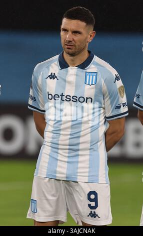 Adrian Martinez of Argentina's Racing Club, left, and Jesus Trindade of ...