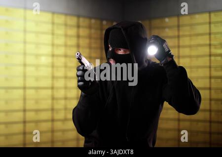 Vault Bank Robbery By Thief In Mask Stock Photo - Alamy