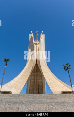 A group of people in Maqam Echahid Monument Square in Algiers City ...