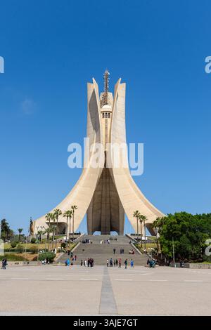 A group of people in Maqam Echahid Monument Square in Algiers City ...
