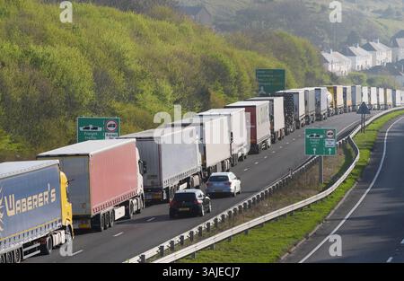 Lorries queue along the A20 outside Dover in Kent as the Port of Dover ...
