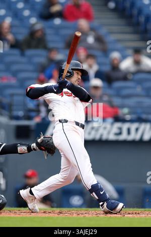 Cleveland Guardians' Steven Kwan, right, reacts after striking out ...