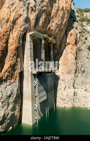 Hydraulic Dam Structure Built into Rock Cliff Stock Photo - Alamy
