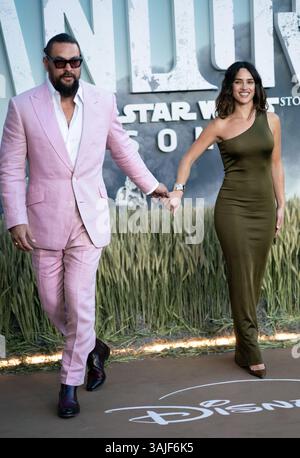 Jason Momoa and Adria Arjona attend the 'Supergirl' UK Sneak Peek Fan ...