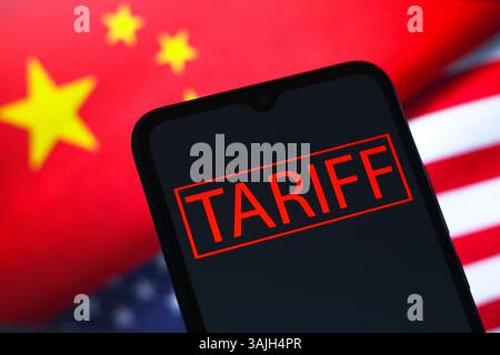 In this photo illustration, the Tariff text is seen displayed on a ...
