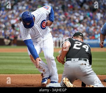 Chicago Cubs third baseman Matt Duffy, left, and relief pitcher Craig ...