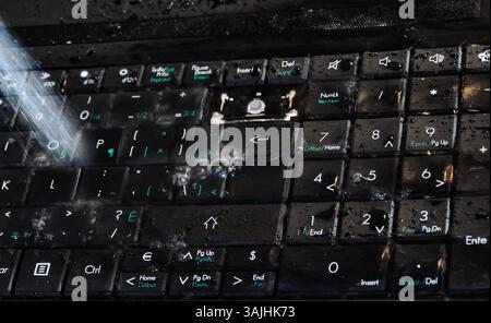 Water spray pouring onto computer keyboard Stock Photo - Alamy