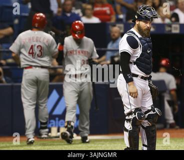 Cincinnati Reds' Scott Schebler (43) celebrates with Joey Votto, center ...