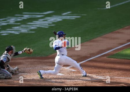 New York Mets' Juan Soto reacts after fouling a ball off his leg while batting during the fourth ...