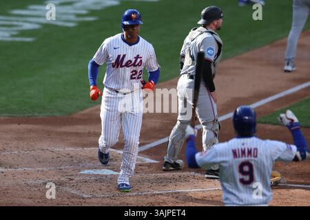 New York Mets Juan Soto walks to the dugout out after fouling out in the 2nd inning against the ...