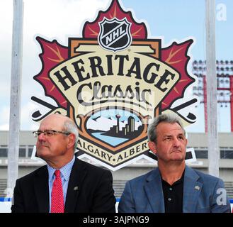 NHL commissioner Gary Bettman, left, shakes hands with Lanny McDonald ...