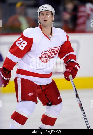 Detroit Red Wings Brian Rafalski blocks a shot by Pittsburgh Penguins ...