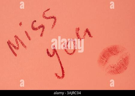 Miss you - red lipstick lettering on pink Stock Photo - Alamy
