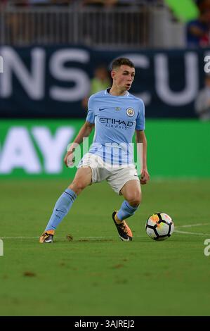 Manchester City midfielder Phil Foden (47) celebrates with teammates ...