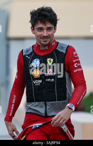 Charles Leclerc of Scuderia Ferrari looks on in the Paddock during ...