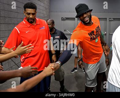 NBA star LeBron James, right, of Los Angeles Lakers attends the POWER ...