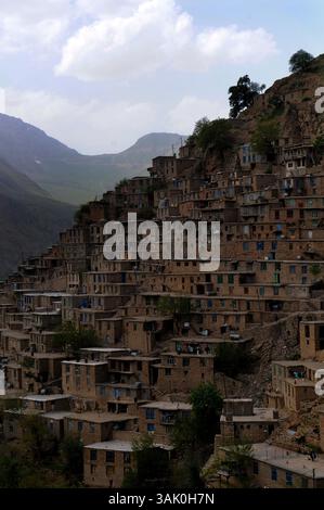 May 07, 2009 - Hawraman, Iran - An old woman descends the stairs in ...