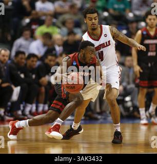 Jacksonville State guard Tyrik Edwards (4) drives on Louisville guard ...