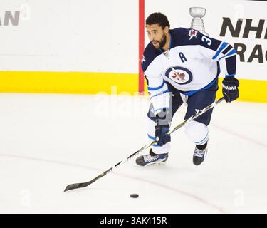 Winnipeg Jets defenseman Dustin Byfuglien arrives at the NHL hockey All ...