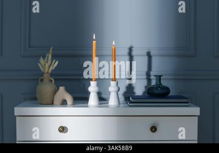 Chest of drawers with candles and vase near color wall Stock Photo - Alamy