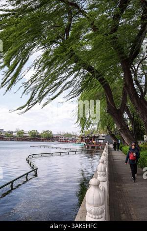 Beijing, China. 12th Apr, 2025. People walk at Shichahai scenic area in ...