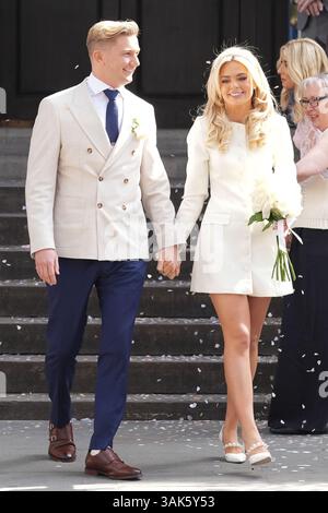 News broadcaster Ellie Costello and her new husband Gerard Durkan pose ...