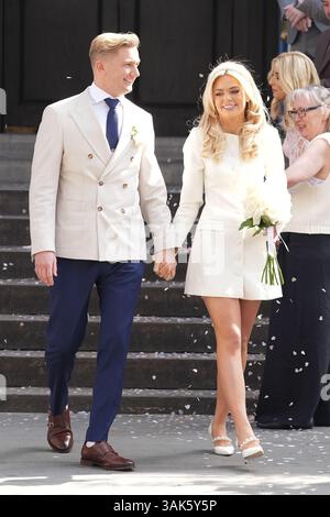 News broadcaster Ellie Costello and her new husband Gerard Durkan pose ...