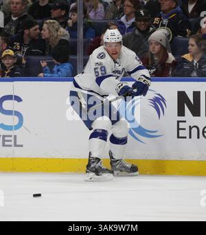 Tampa Bay Lightning center Jake Guentzel (59) controls the puck on an ...