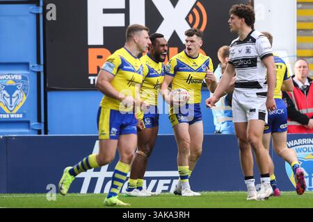 Josh Thewlis of Warrington Wolves celebrates his try during the Betfred ...
