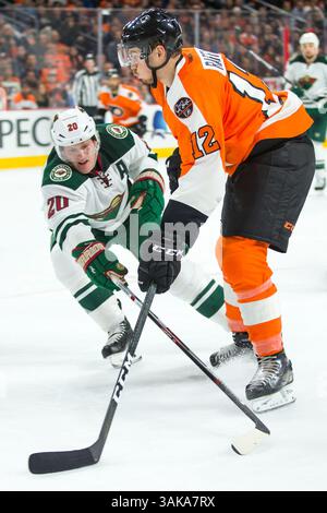 Philadelphia Flyers' Michael Raffl (12) collides with New York ...