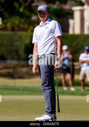 Matthew Fitzpatrick, of England, watches his putt on the fifth hole ...