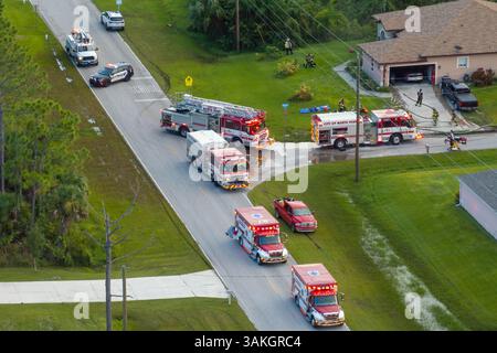 First responders at potential fire hazard at Florida home. Firefighter ...