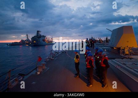 USS Sterett (DDG 104) and USS Dewey (DDG 105) conduct replenishment-at ...