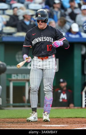 Minnesota Twins' Harrison Bader (12) scores on a double hit by Willi ...