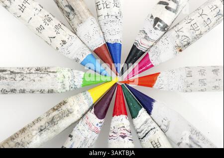 Chinese color pencils made from newspapers over white Stock Photo - Alamy