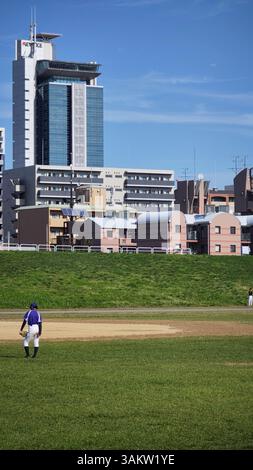 Keyence headquarters building exterior and outdoor baseball field near ...