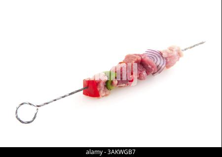 Pig meat pins with vegetables for roasting on the barbecue Stock Photo ...