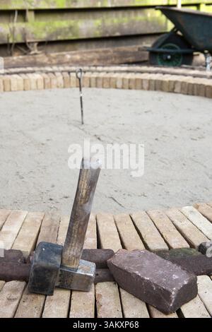 Making a new pavement circle in two colors Stock Photo - Alamy