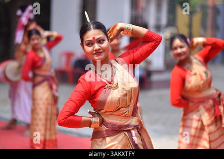 Assam. 12th Apr, 2025. Women in traditional dress perform folk dance ...