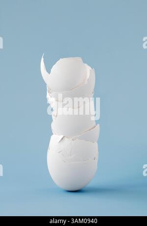 Stack of egg shells on white background Stock Photo - Alamy