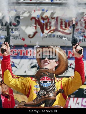 Joey Logano celebrates in victory lane after winning a NASCAR Cup ...