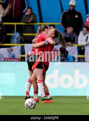 Manchester United's Elisabeth Terland (left) celebrates scoring their ...