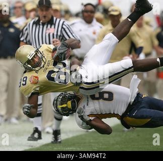 Georgia Tech's James Johnson (89) catches a pass in front of Virginia ...