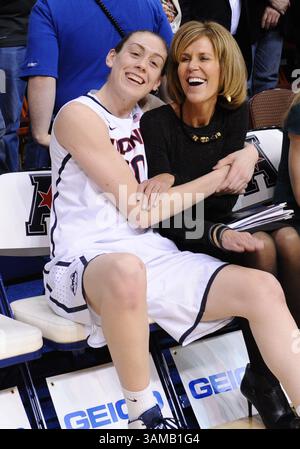 UConn associate head coach Chris Dailey, right, speaks to UConn's ...